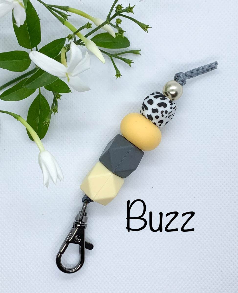 Buzz (keychain) – Dusty Rainbows